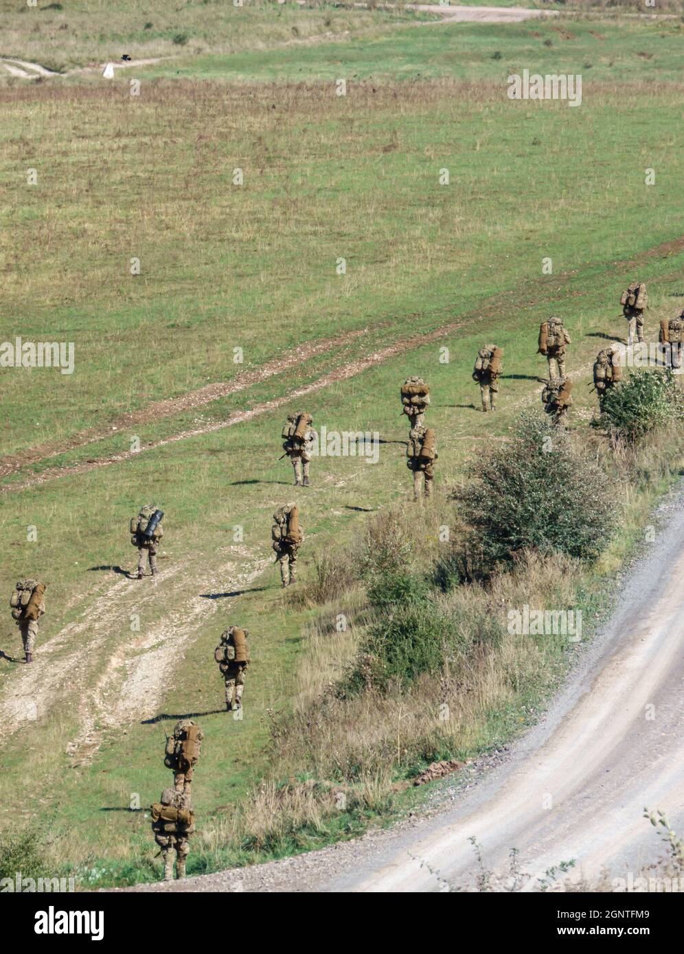 british army GCC infantry soldiers on a 4km combat training test tab ...