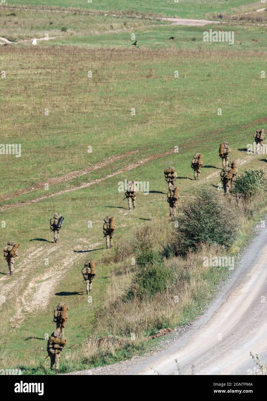 british army GCC infantry soldiers on a 4km combat training test tab ...