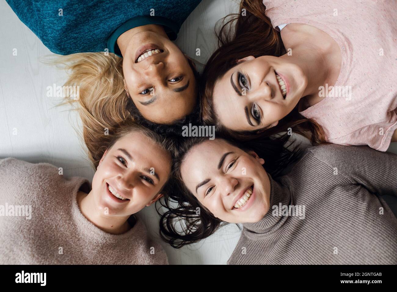 Four best girls friends talking at home. girls spend time together and ...