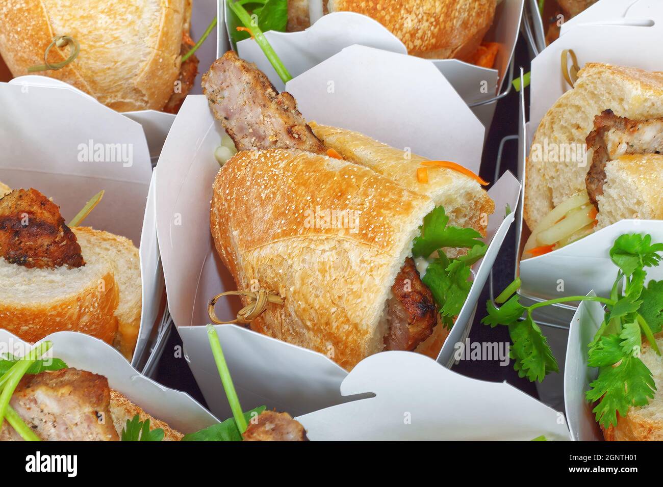 Meat sandwiches with vegetables prepared for customers. French bread ...