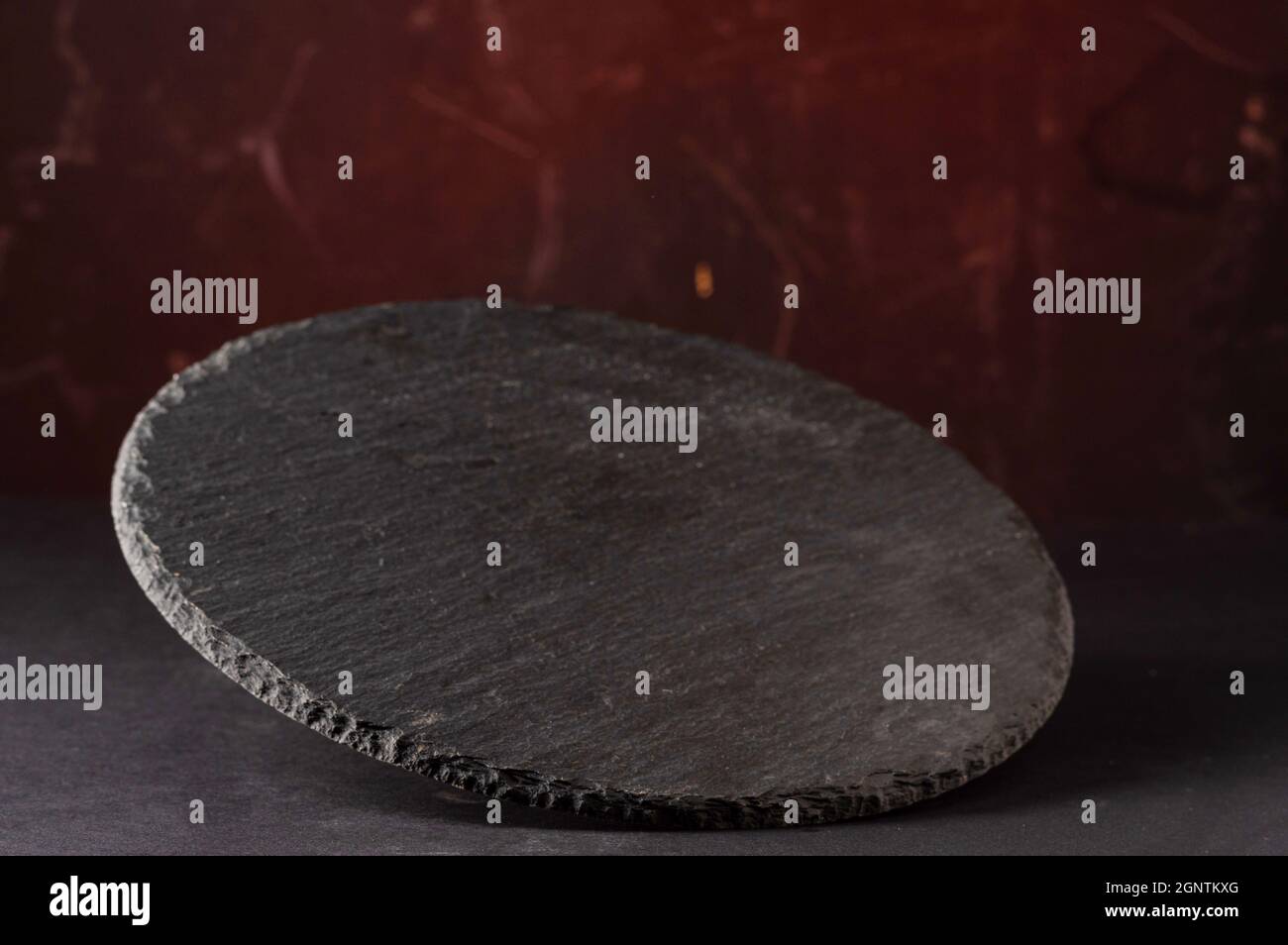 Round food stand. Diverse red background. Flying tray on a red ...