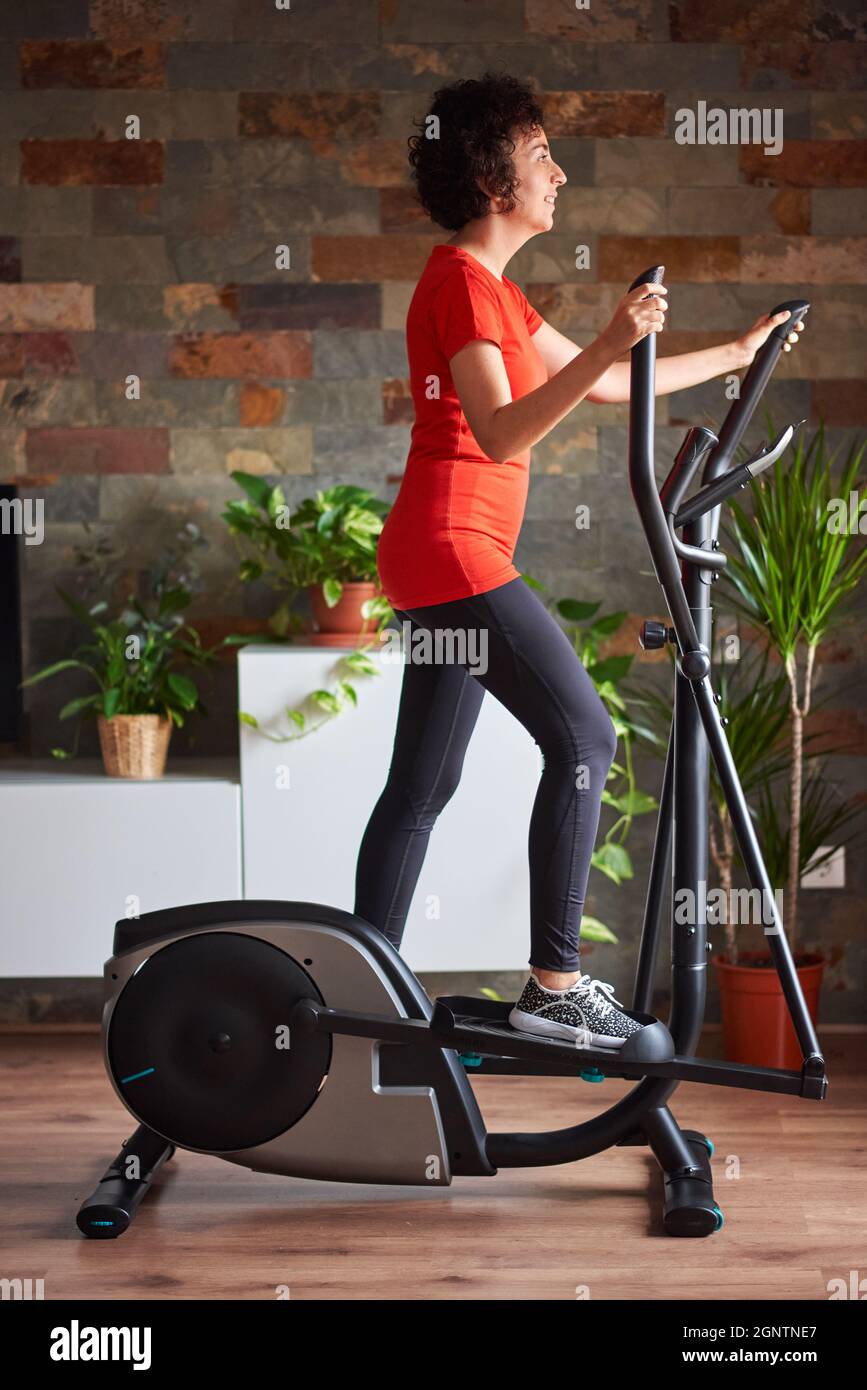 Riding Elliptical Bike High Resolution Stock Photography and Images - Alamy