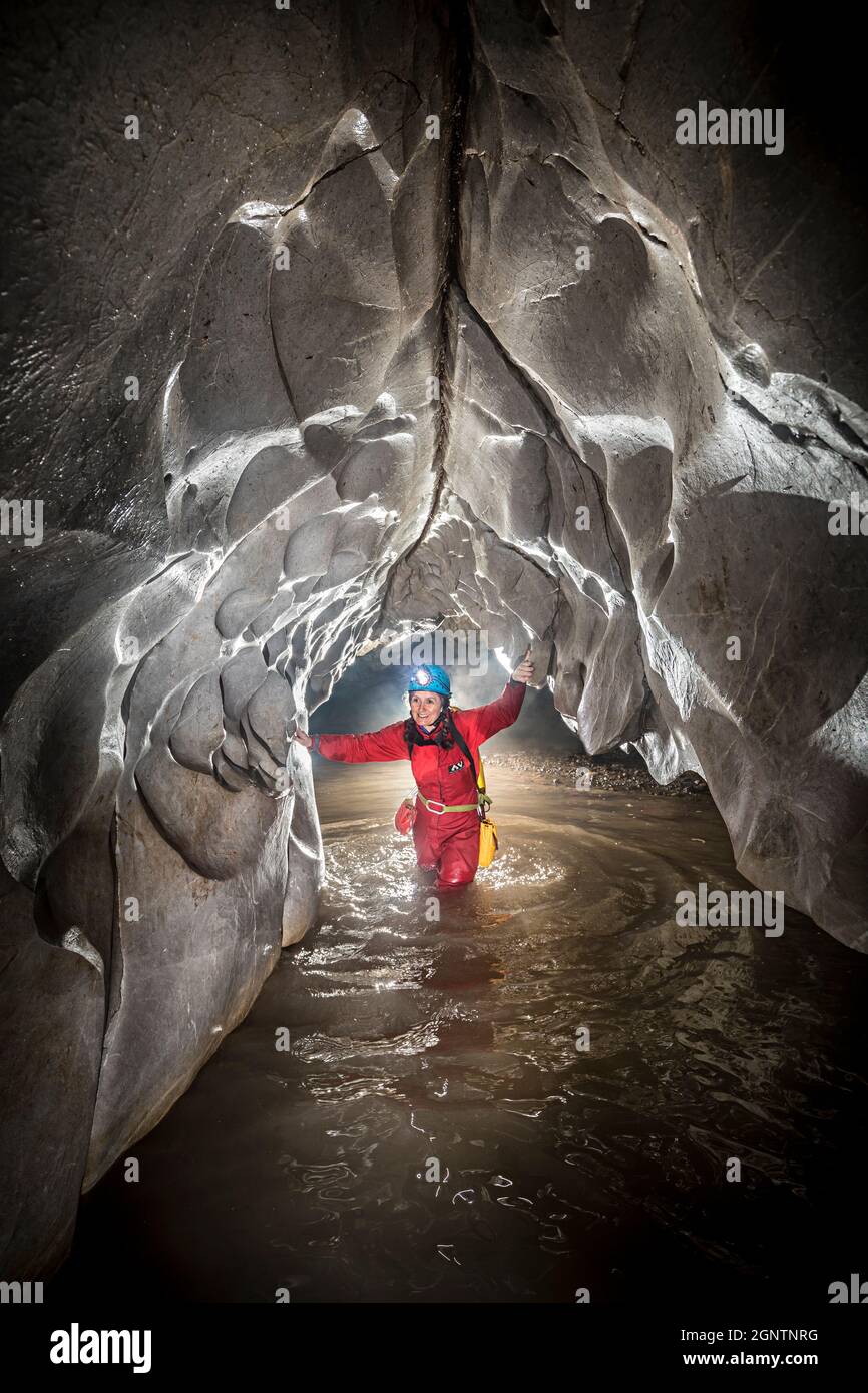 Woman caving spelunking cave hi-res stock photography and images - Alamy