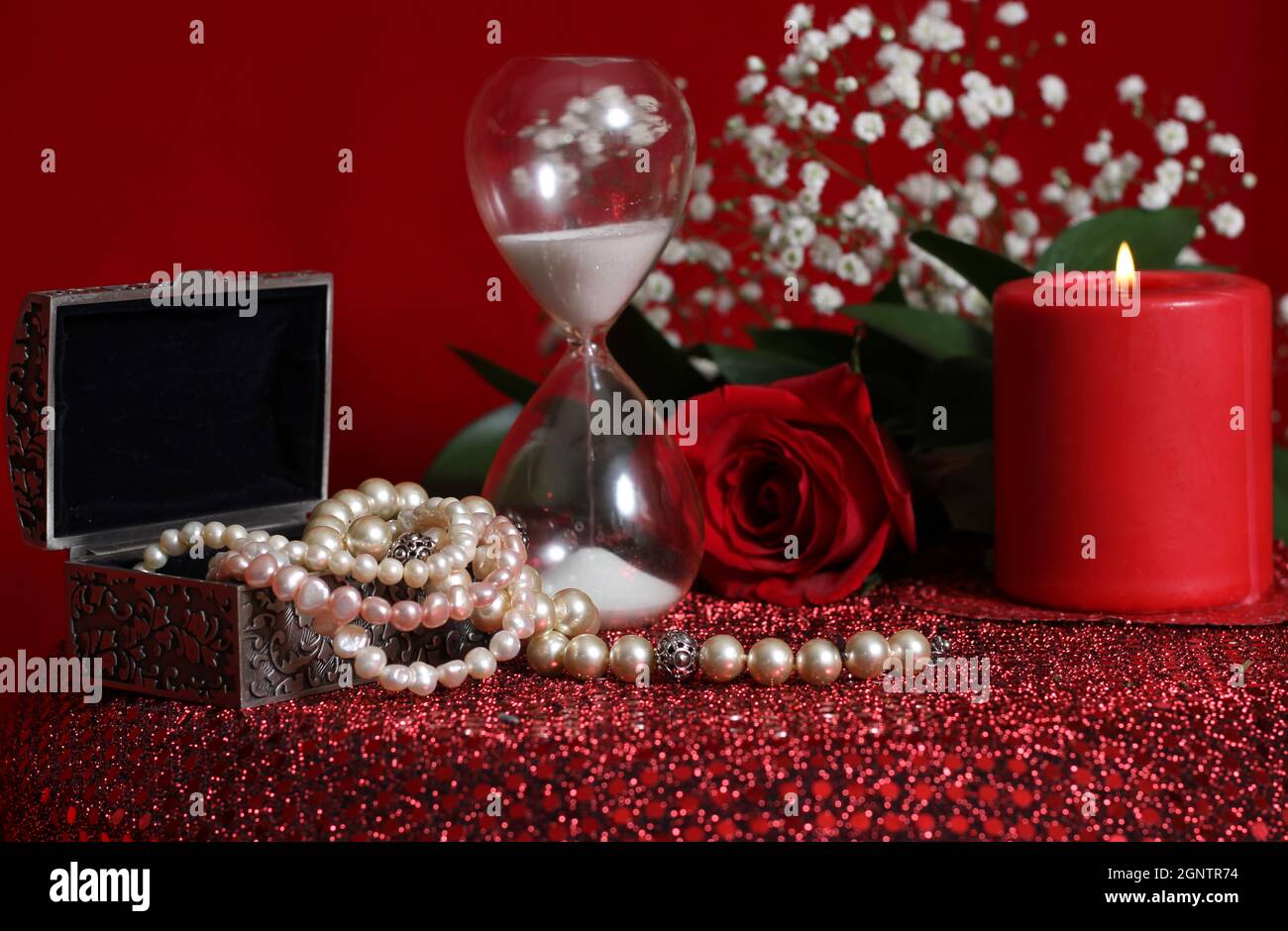 Red Candle and Rose on Red Velvet Background Stock Photo - Alamy