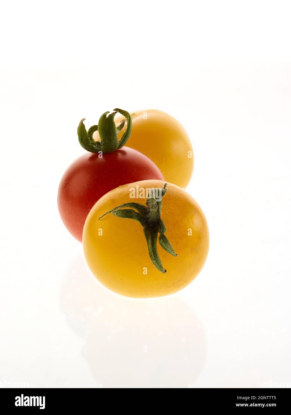 Bite sized tomato on white background, high resolution food ingredient ...