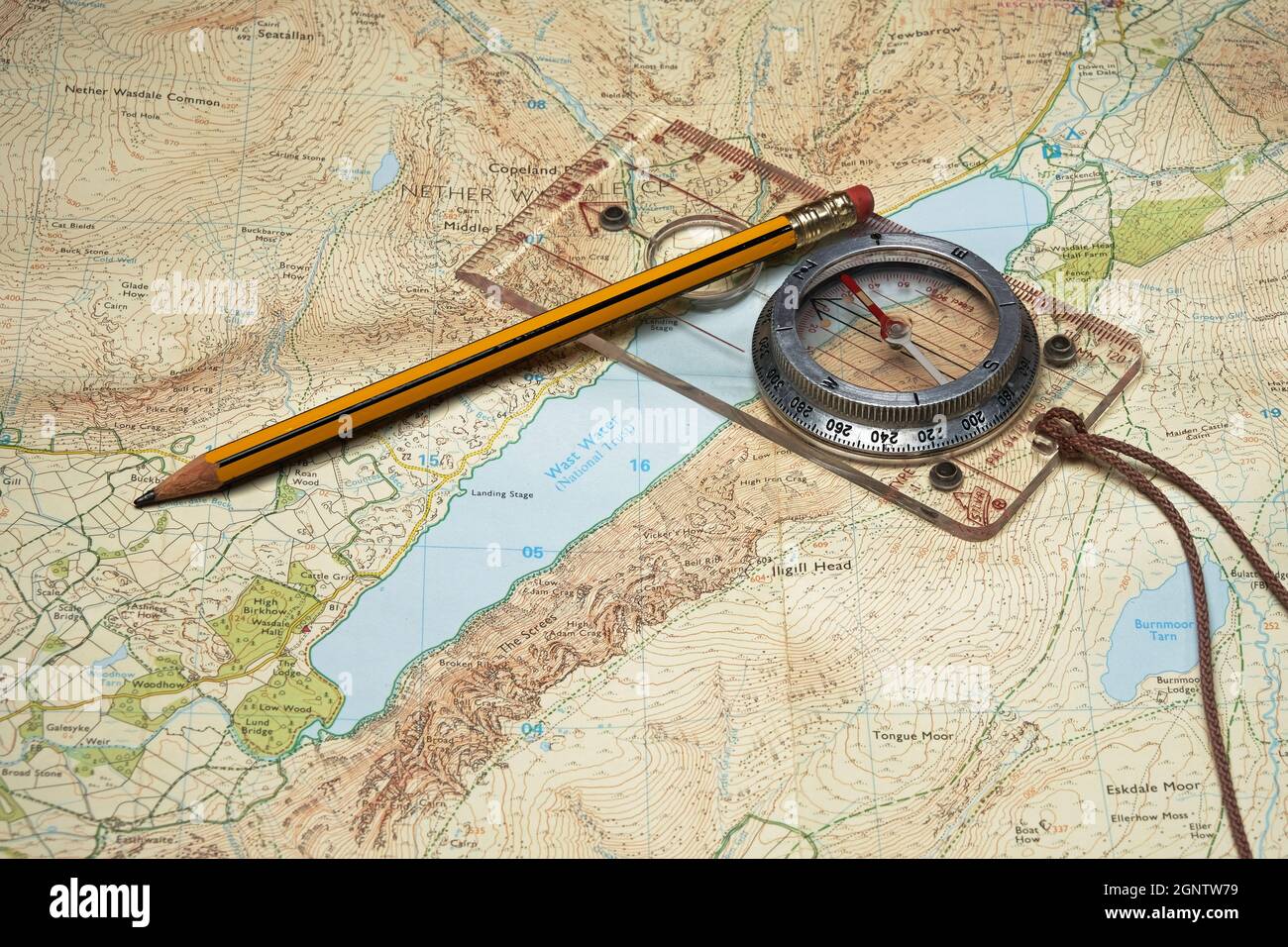 Old School Navigation - Map and Compass Stock Photo - Alamy