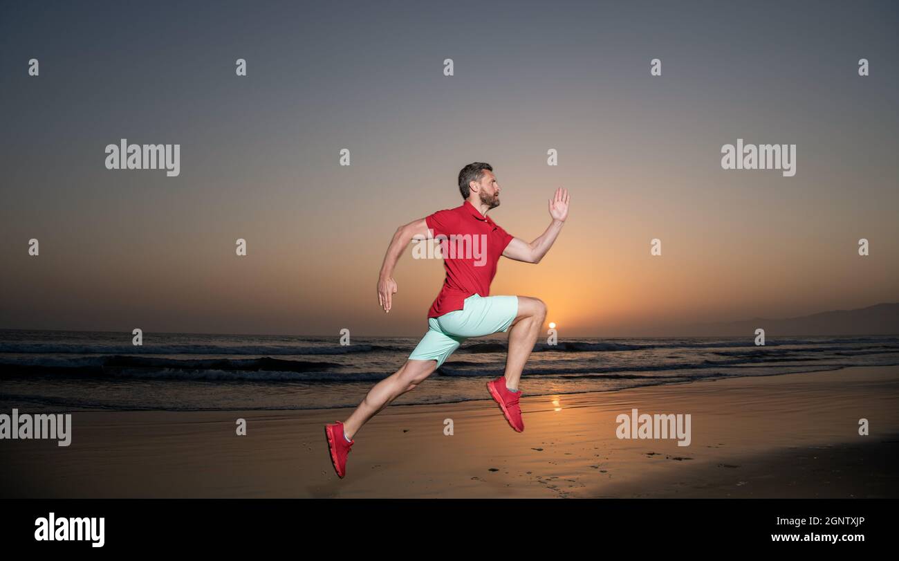 athletic man runner running on sunset summer beach, challenge Stock ...