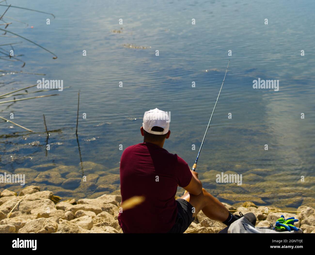 Reeling in a fish hi-res stock photography and images - Alamy