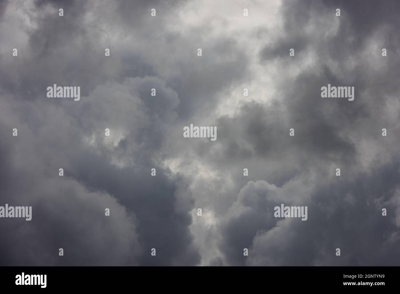 grey incoming storm clouds full frame background Stock Photo - Alamy