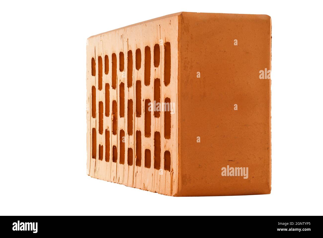Perforated red brick isolated on white background Stock Photo - Alamy