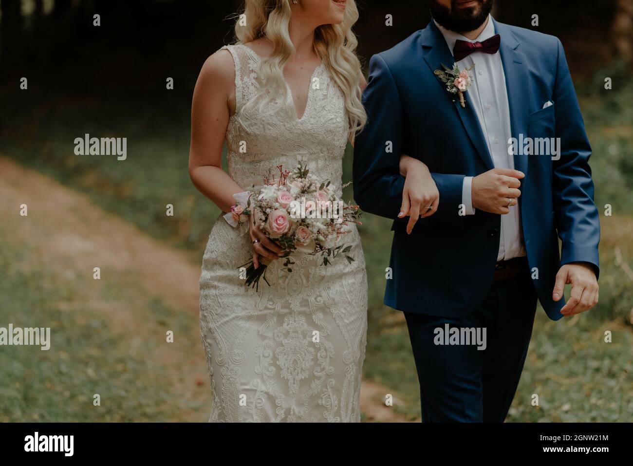 Couple linked arms hi-res stock photography and images - Alamy