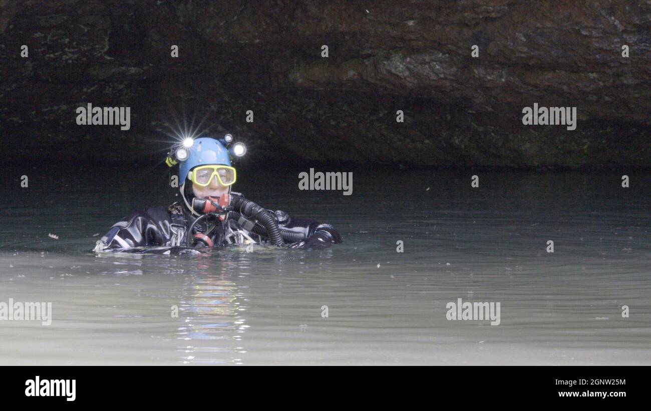 THE RESCUE, cave diver emerges from water, 2021. © National Geographic ...