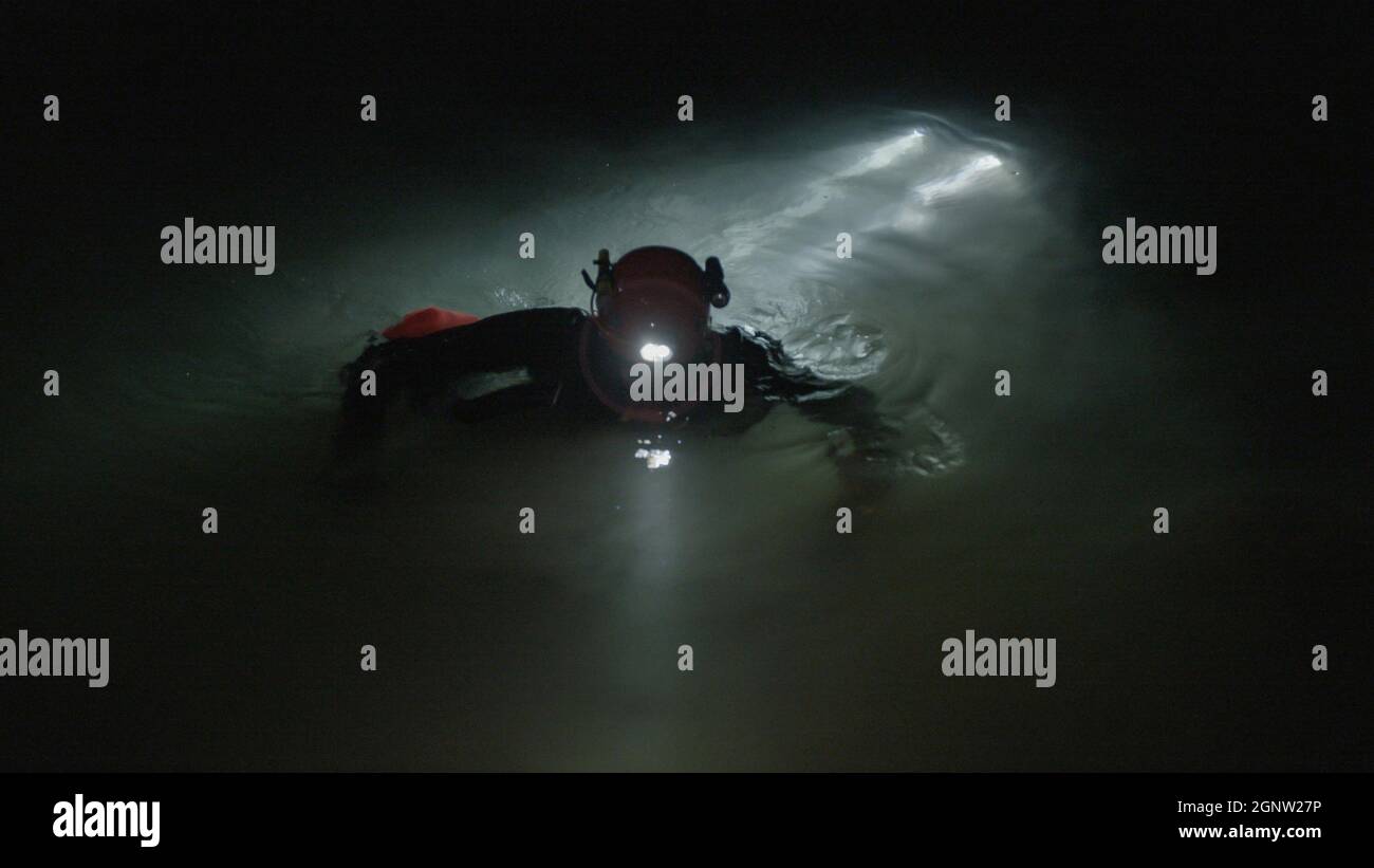 THE RESCUE, cave diver emerges from water, 2021. © National Geographic ...