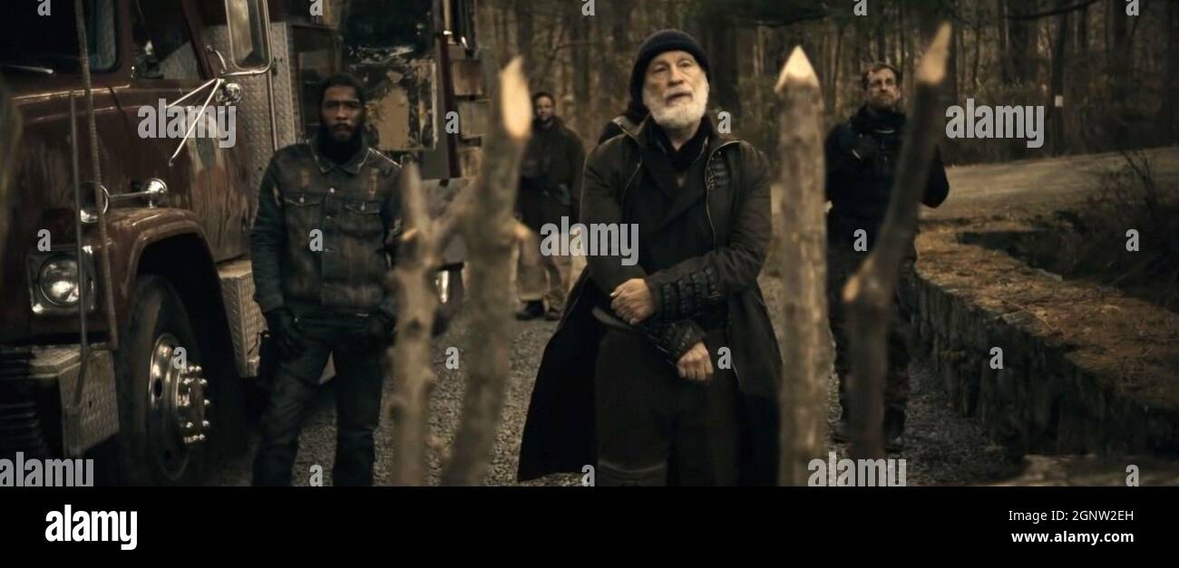 THE SURVIVALIST, foreground from left: Thaddeus Street, John Malkovich ...