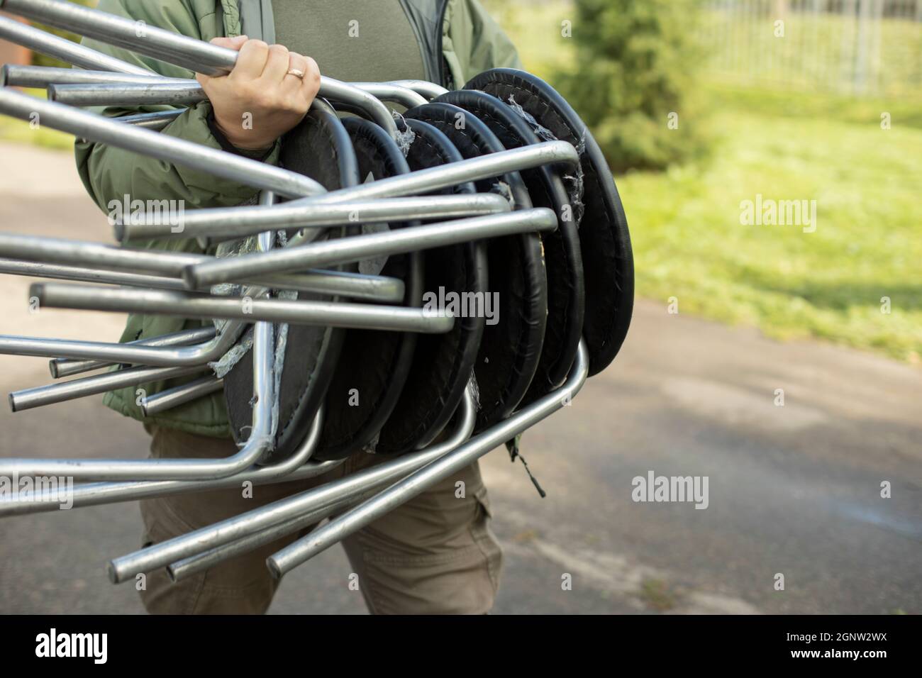 Hand gripping chair hi-res stock photography and images - Alamy