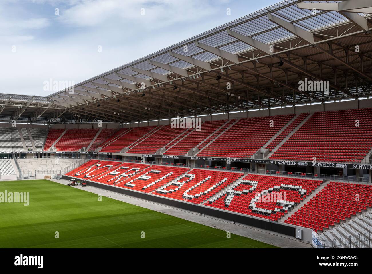Freiburg, Germany. 27th Sep, 2021. Coloured seats on a grandstand of ...