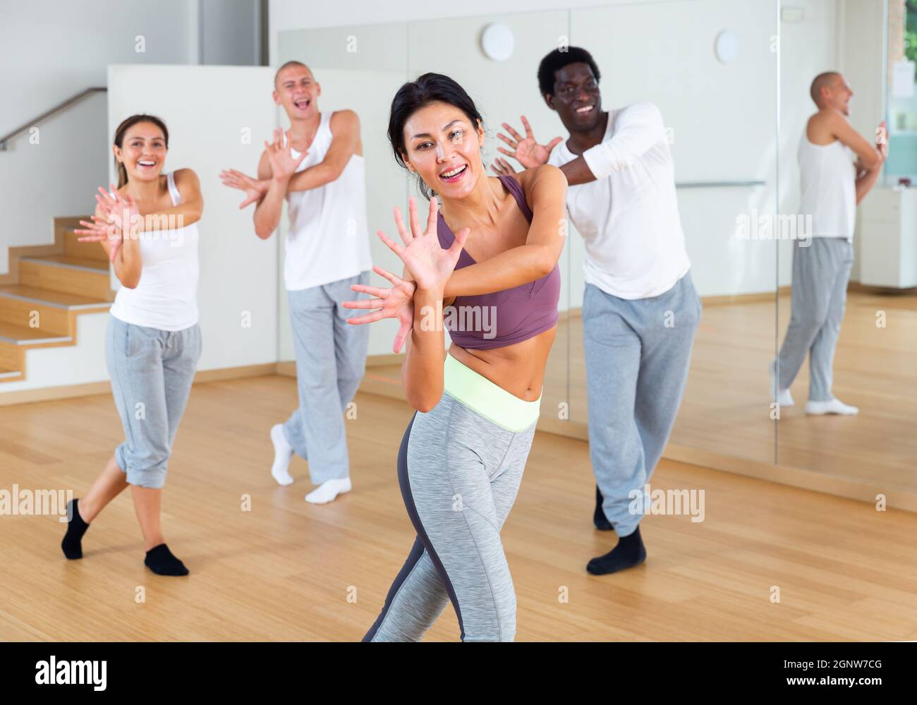 Happy asian woman enjoying active dancing in dance class Stock Photo ...