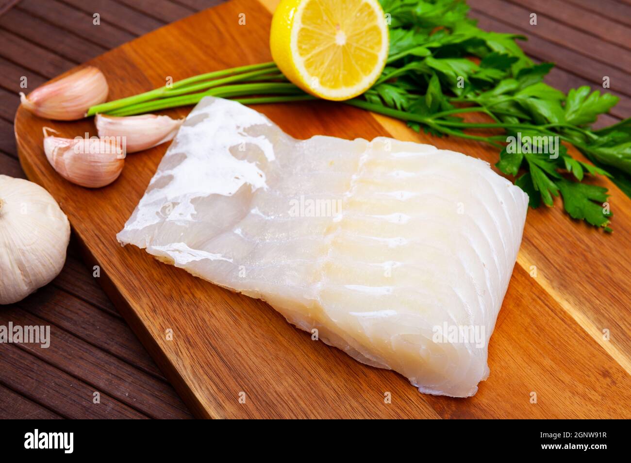 Raw pink cusk-eel fish fillet, seafood ingredients Stock Photo - Alamy
