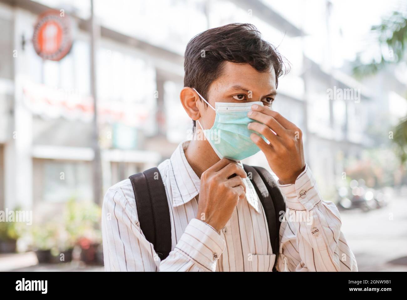 student wearing face mask before going to school or campus Stock Photo ...