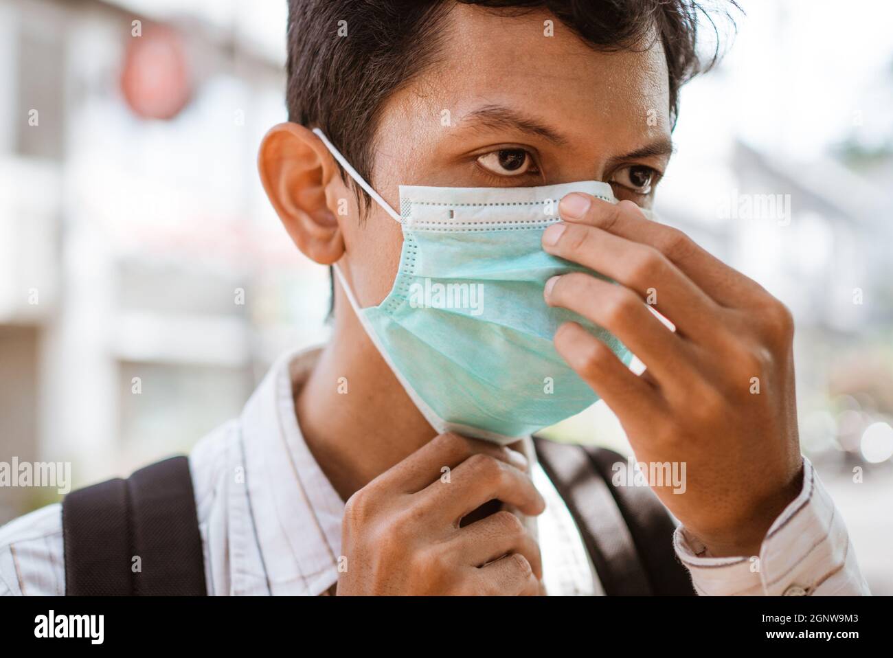 student wearing face mask before going to school or campus Stock Photo ...