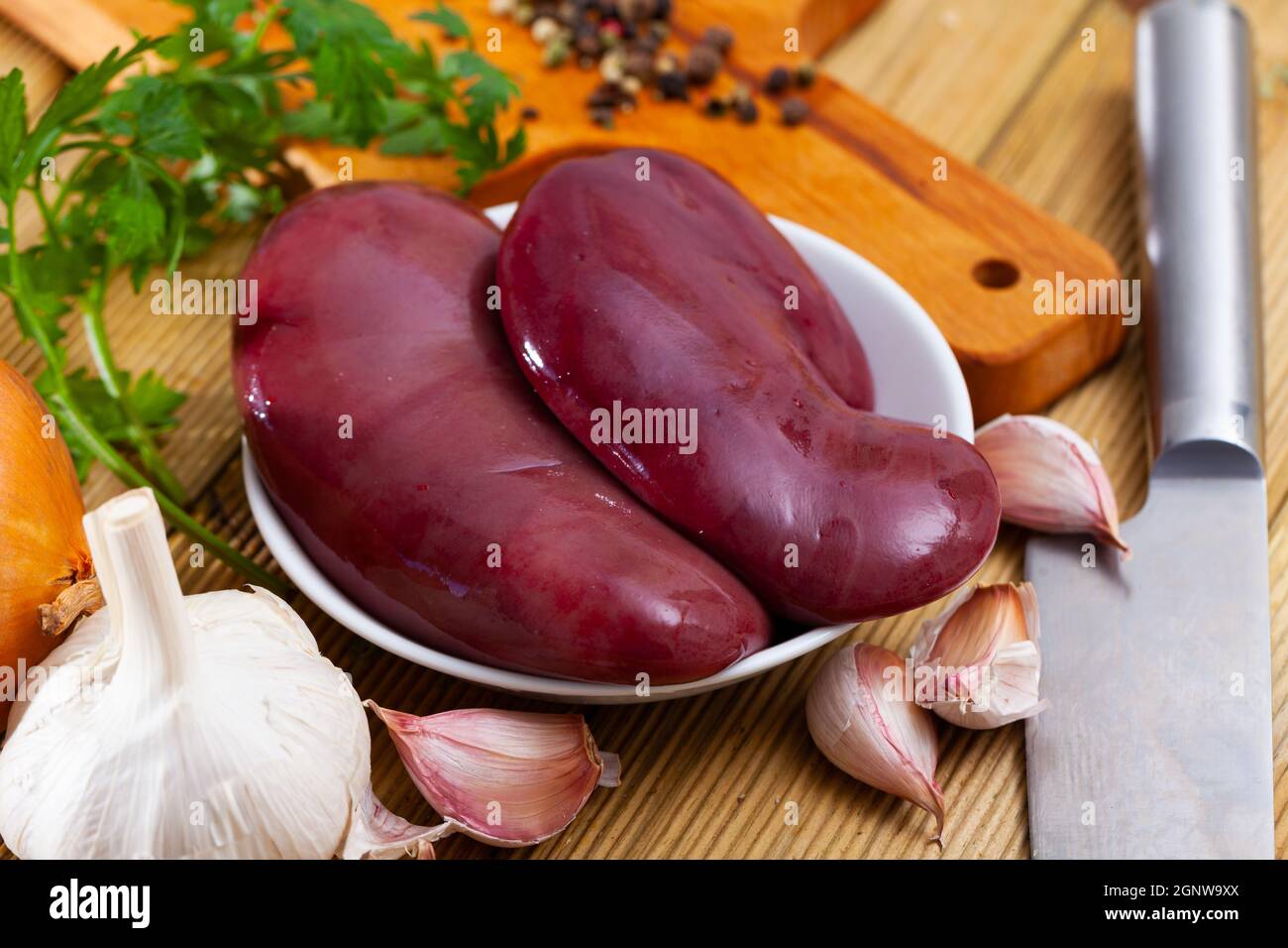 Raw pork kidneys Stock Photo - Alamy