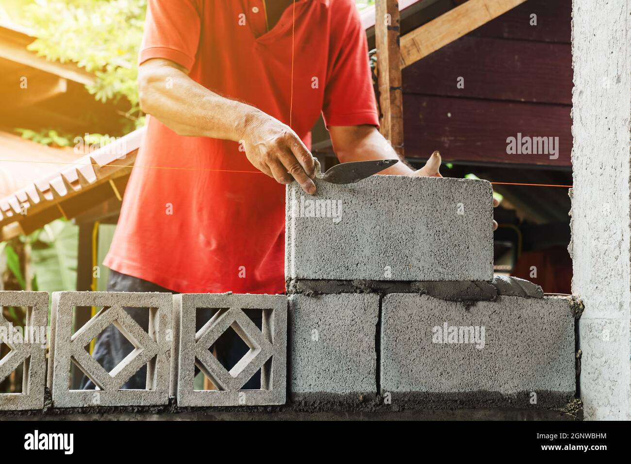 bricklayer man working build for construction at home Stock Photo - Alamy