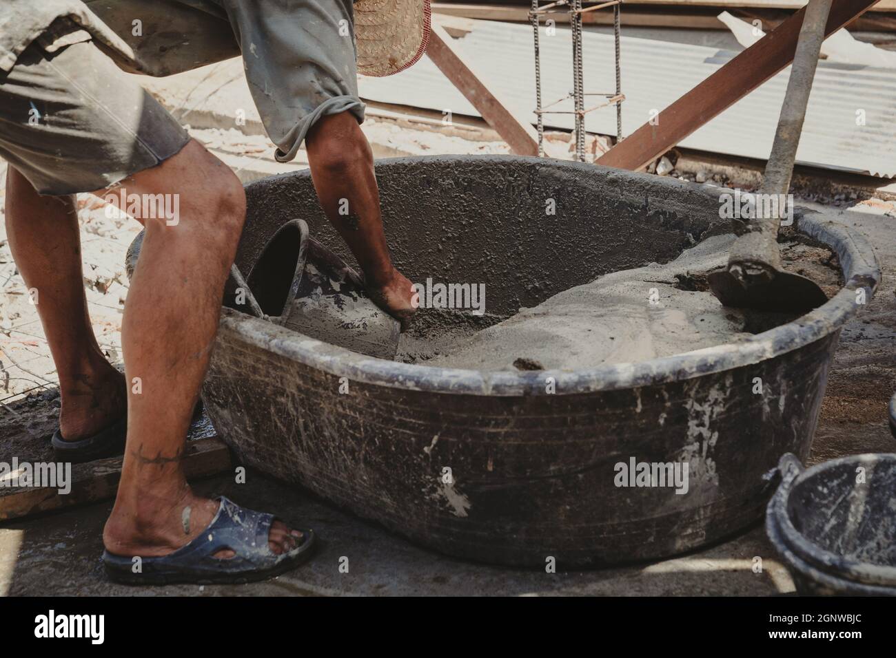 worker mixing cement mortar plaster for construction Stock Photo - Alamy