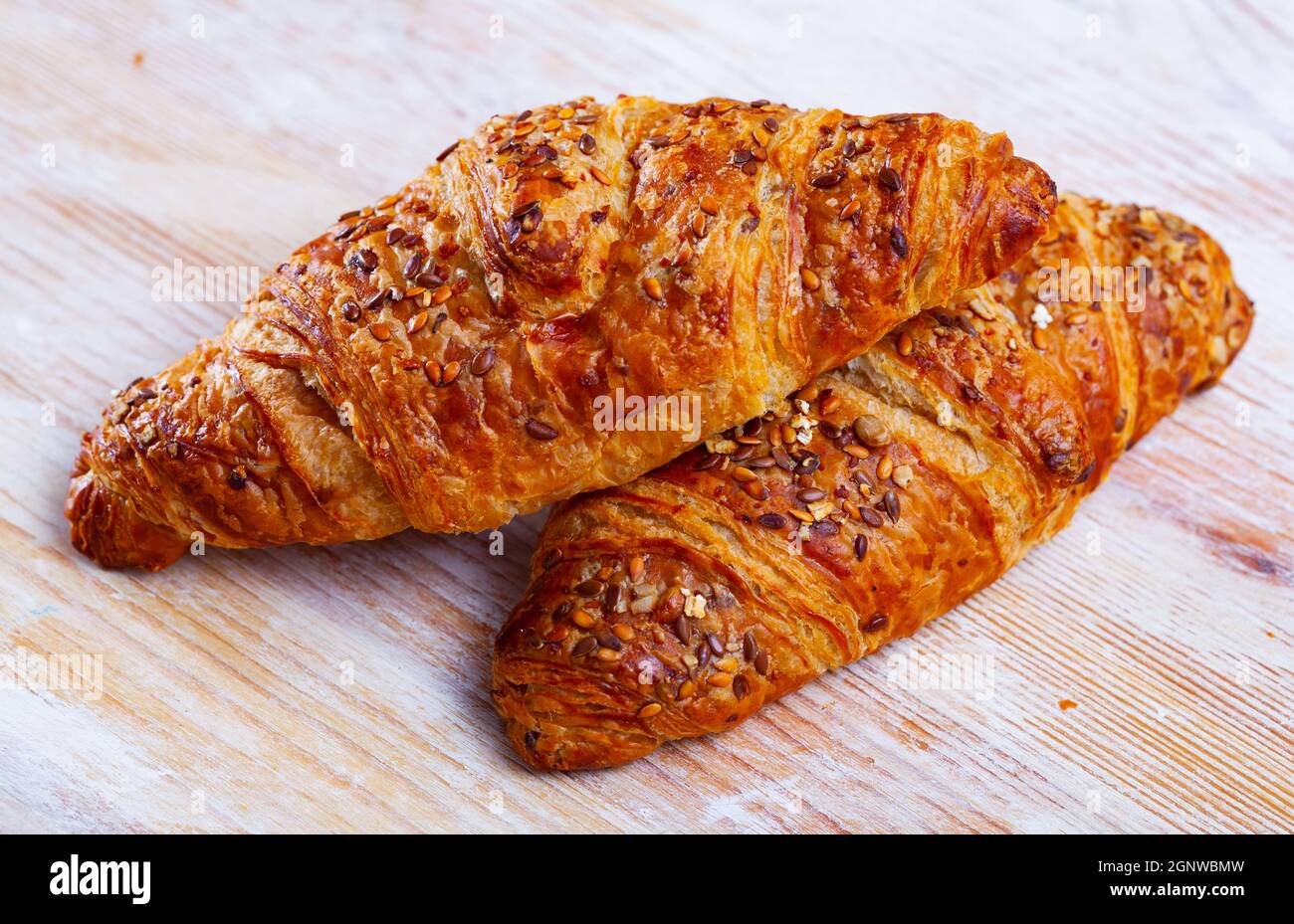 Fresh tasty multigrain croissants on table in kitchen Stock Photo - Alamy