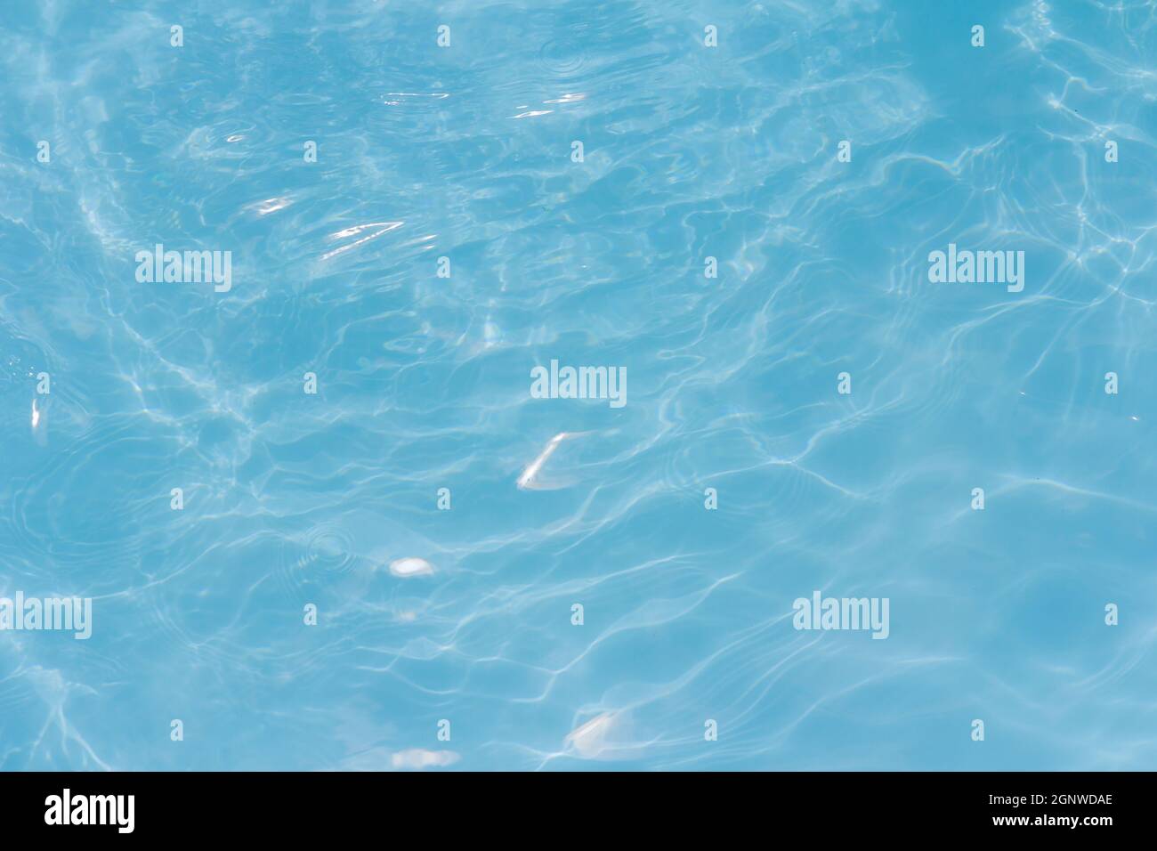 Blue pool water texture reflection background Stock Photo - Alamy