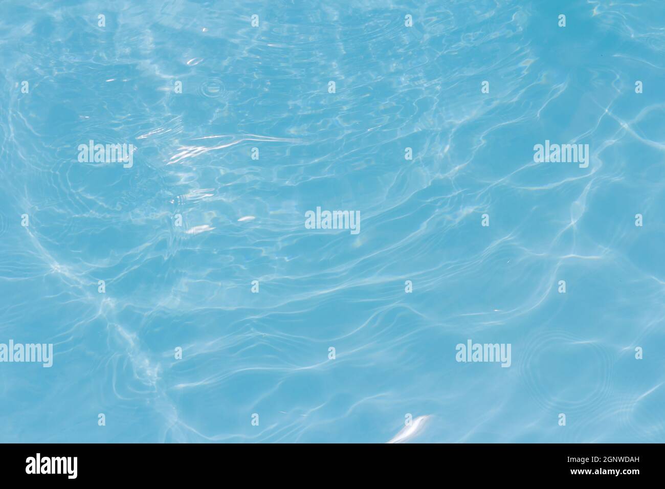 Blue pool water texture reflection background Stock Photo - Alamy