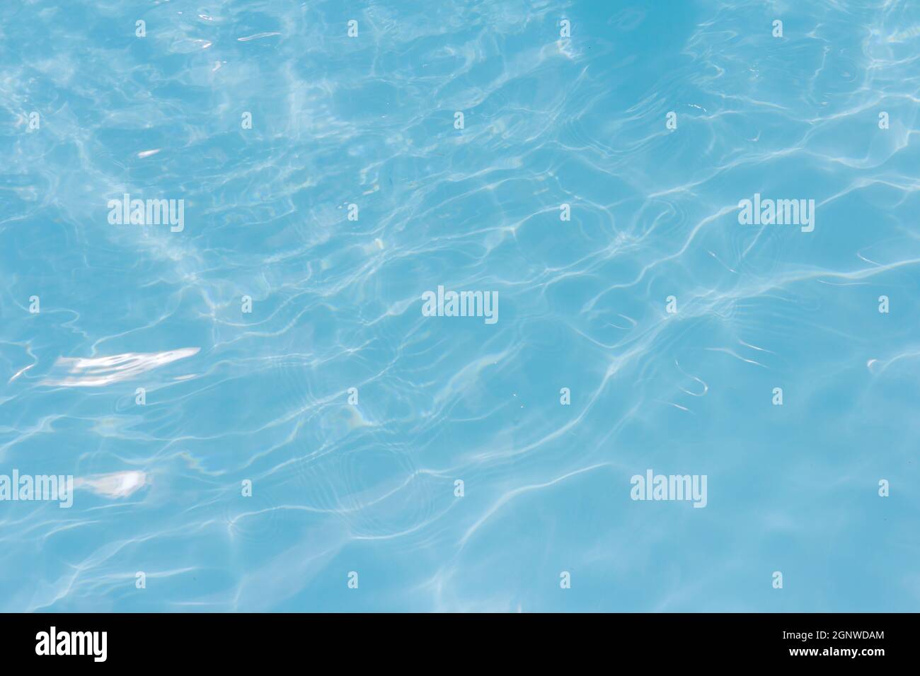 Blue pool water texture reflection background Stock Photo - Alamy