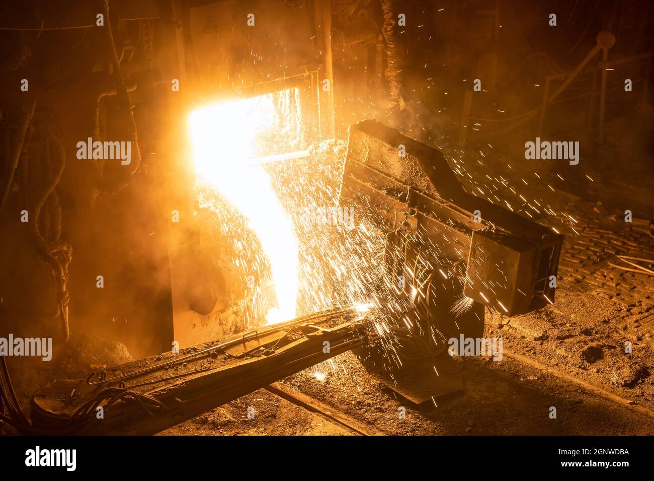 process of taking a sample of liquid metal in a steelmaking furnace ...
