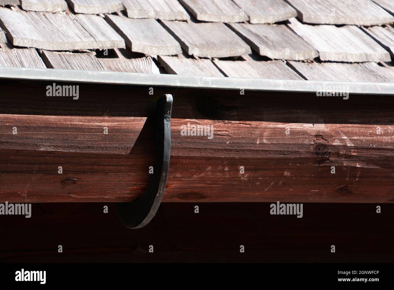 wooden gutter with metal holder for gutters vintage water drainage ...