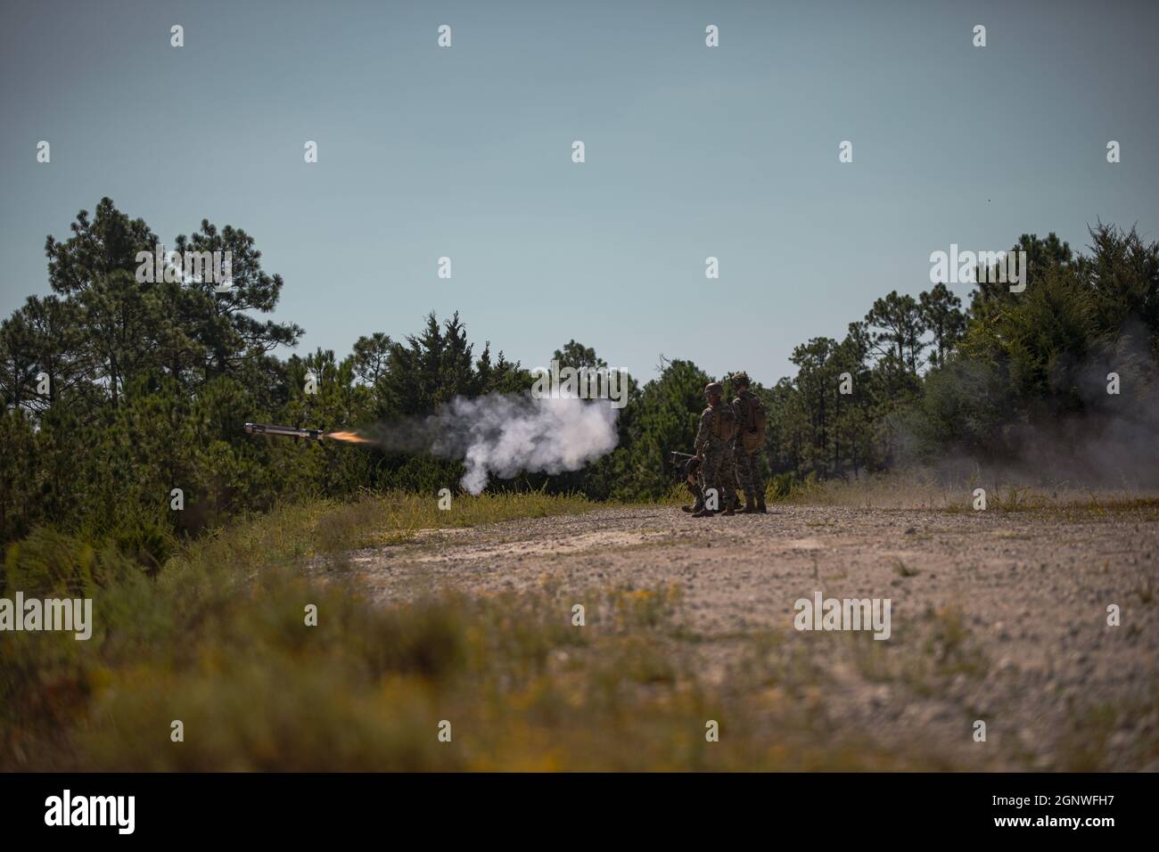 U.S. Marines with Golf Company, 2nd Battalion, 6th Marines fire a M98A2 ...
