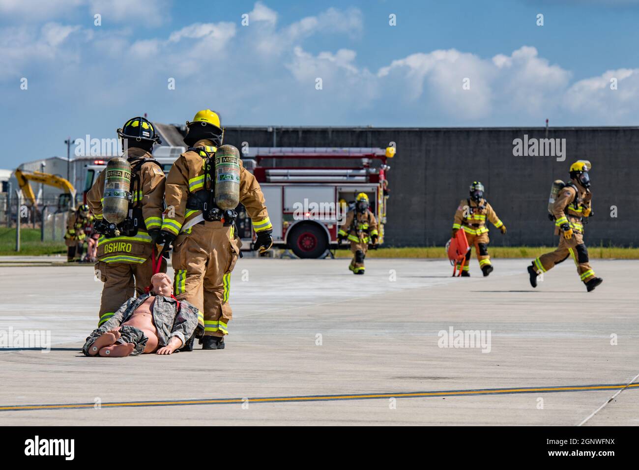 U.S. Air Force firefighters with the 18th Civil Engineering Squadron ...