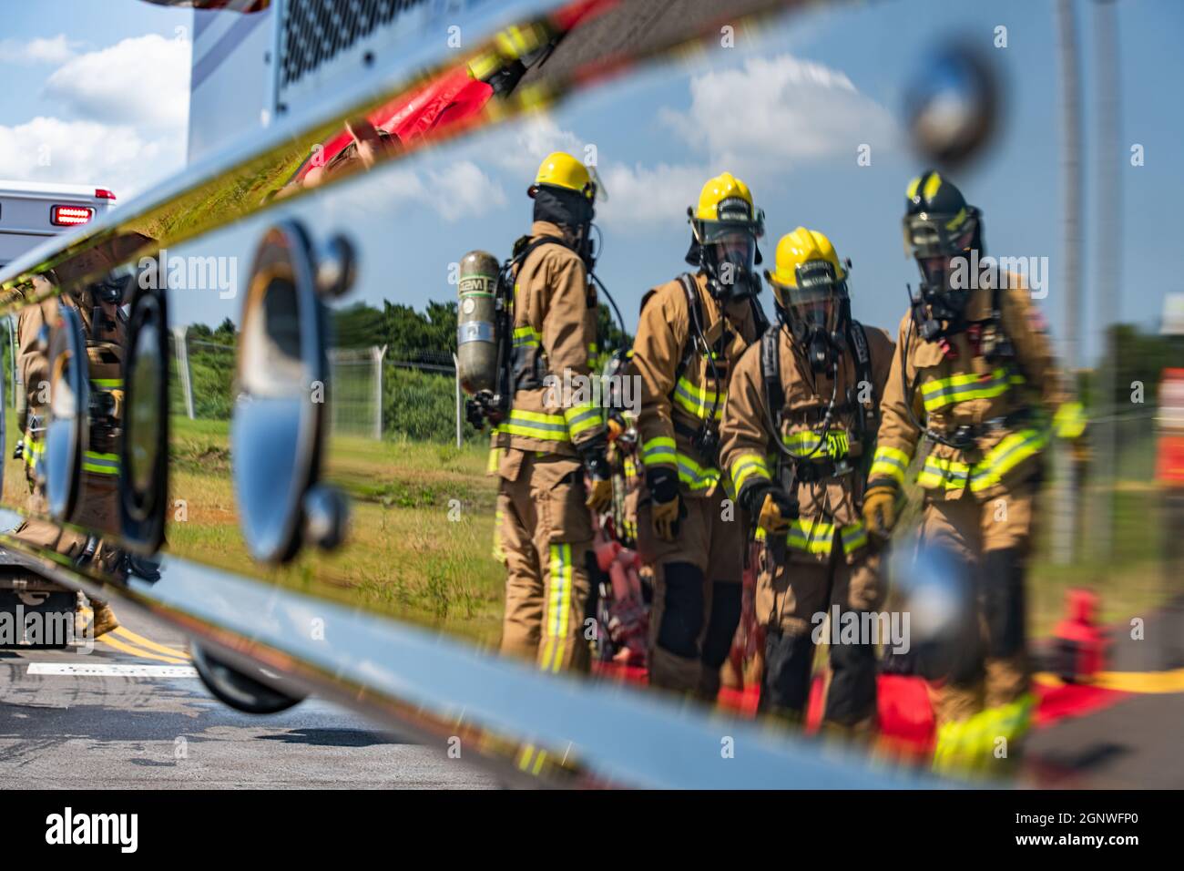 U.S. Air Force firefighters with the 18th Civil Engineering Squadron ...