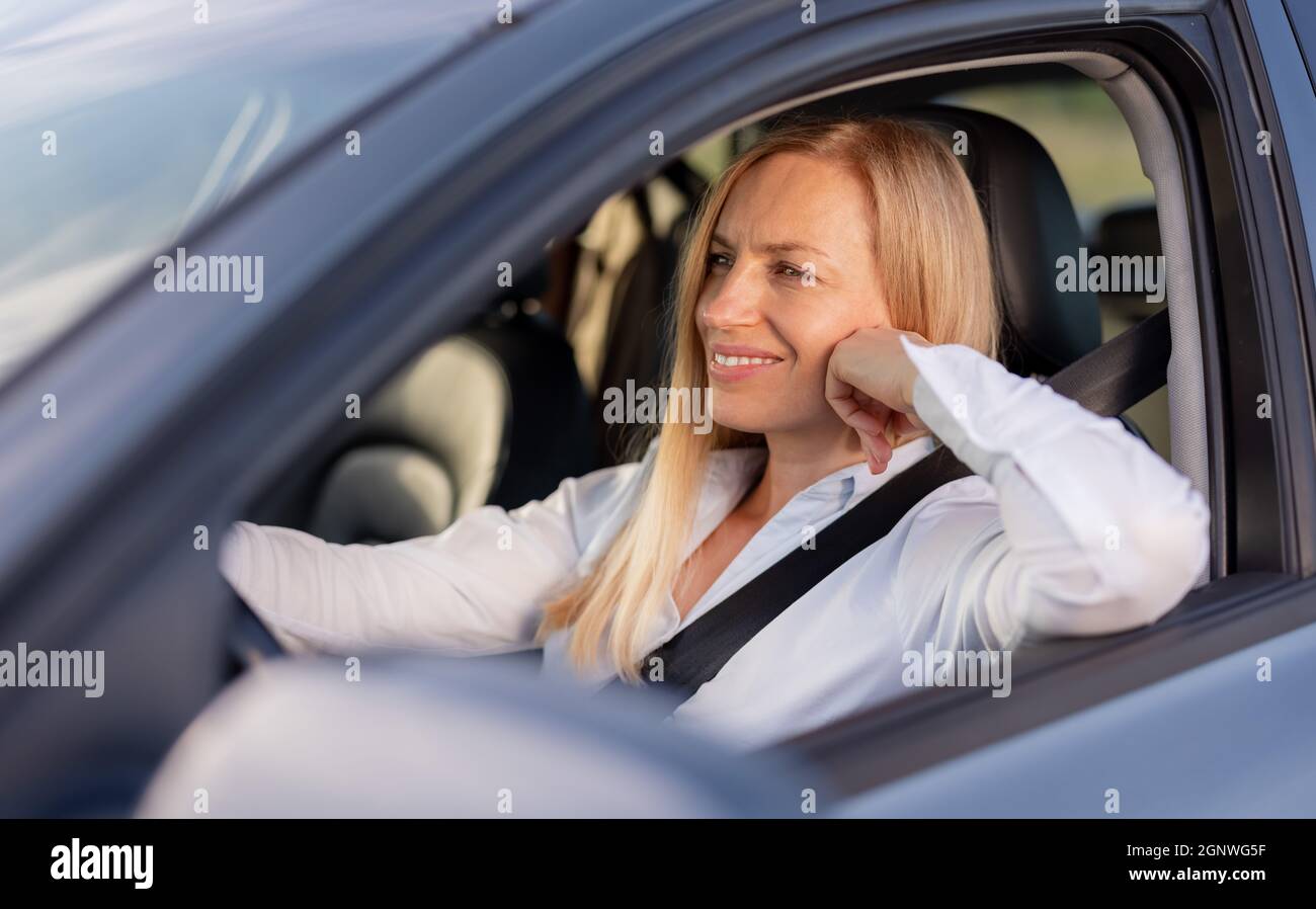 Female driver inside modern car Stock Photo - Alamy
