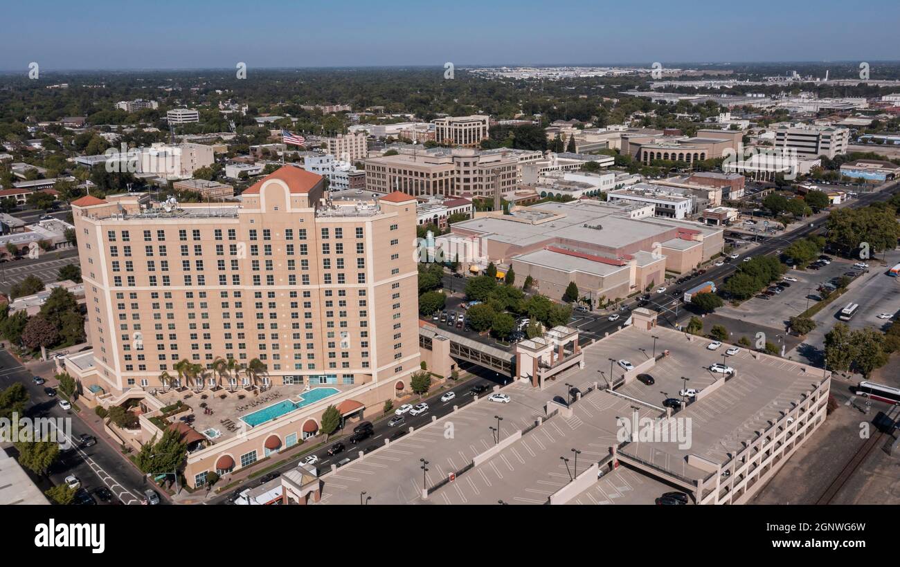 Afternoon aerial view of the urban downtown core of Modesto, California ...