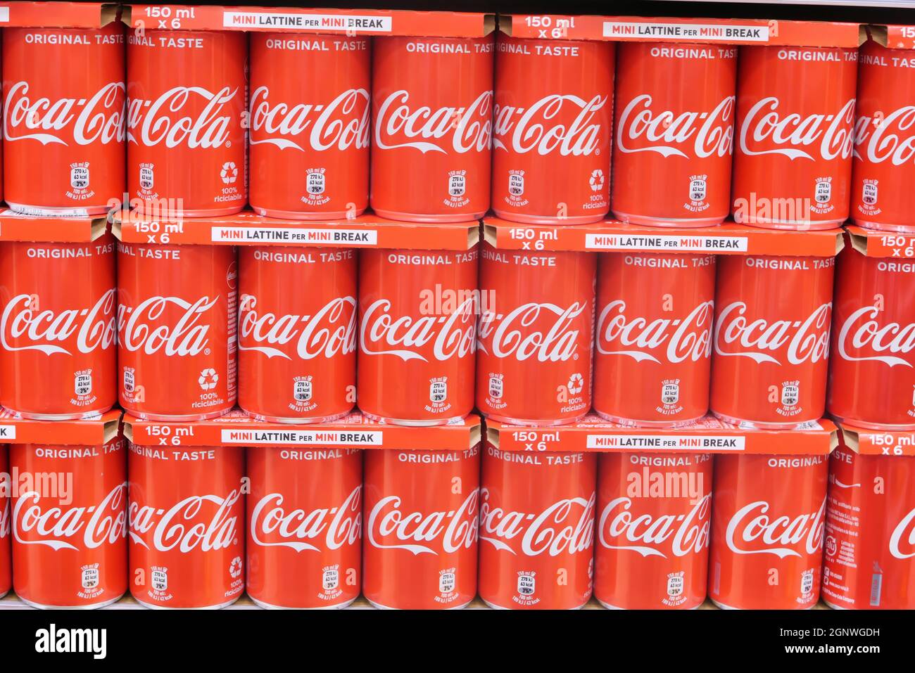 COCA COLA MINI CANS INSIDE THE FOOD MEGA STORE Stock Photo - Alamy