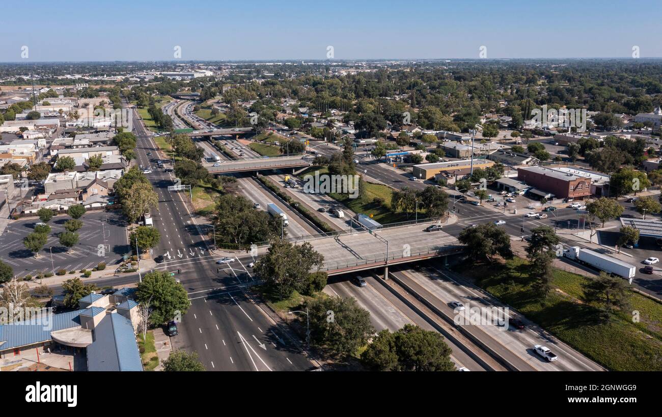 Afternoon aerial view of the 99 Freeway and urban downtown core of ...