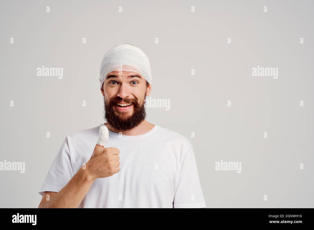 patient with a bandaged head and an eye blood isolated background Stock ...