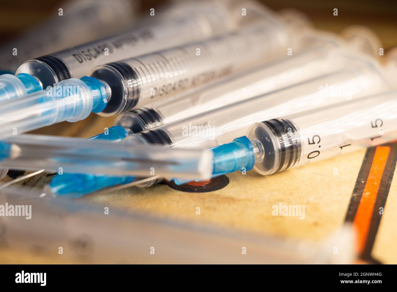 Close-up shot of disposal injection syringes - perfect for a ...