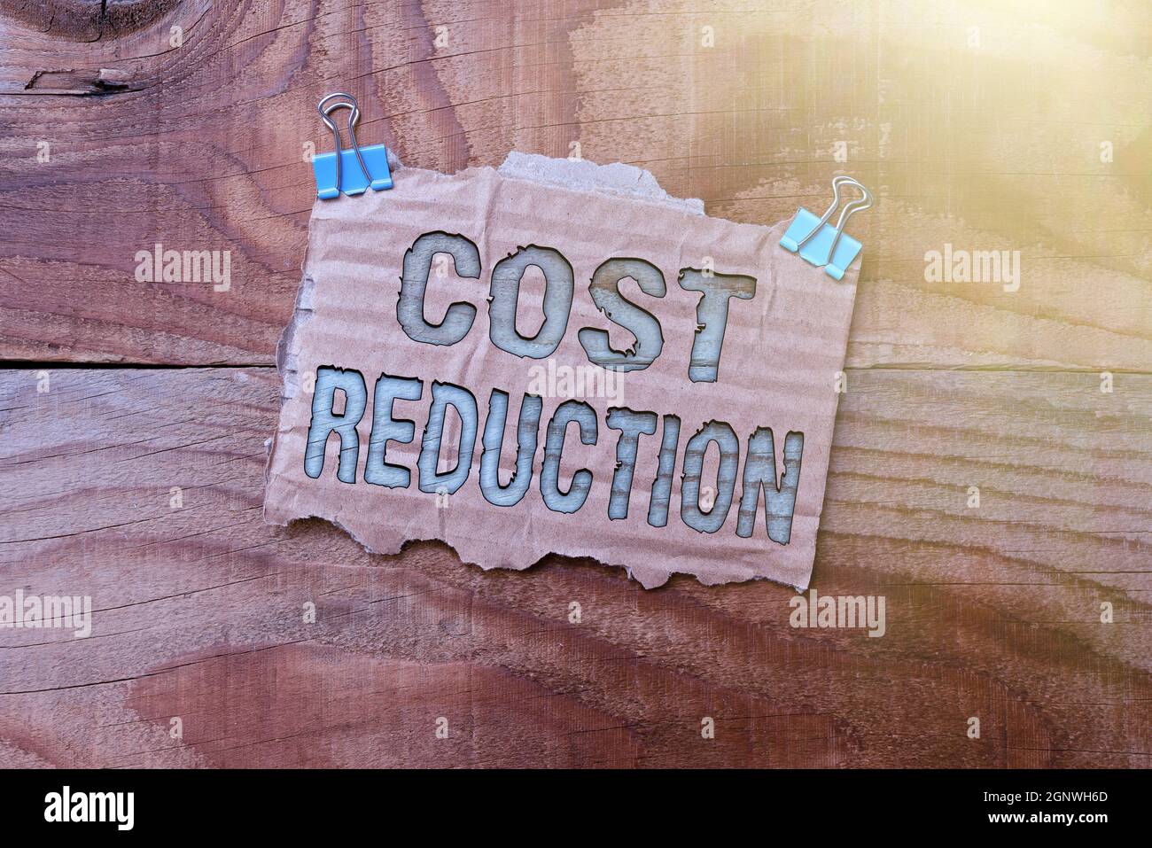 Text caption presenting Cost Reduction. Business concept process of ...