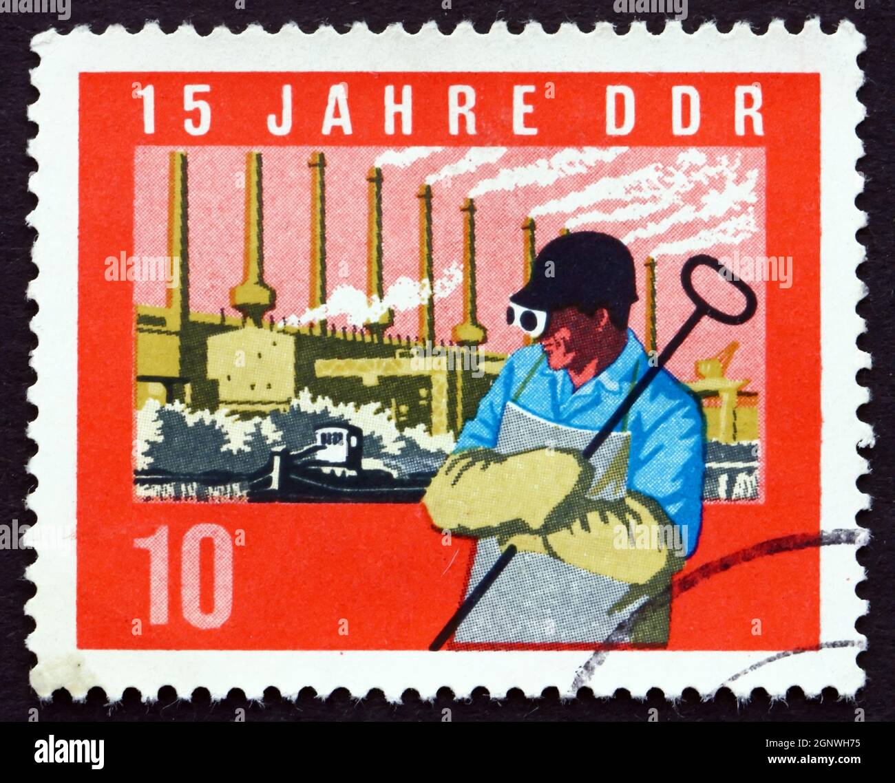 GDR - CIRCA 1964: a stamp printed in GDR shows Steel Worker, Factory ...
