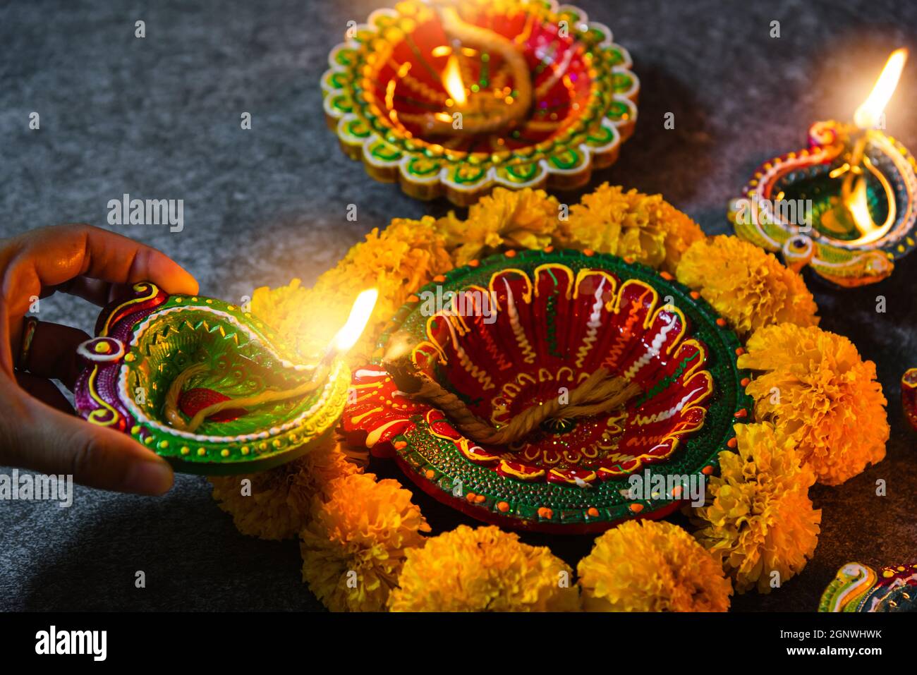 India diwali rangoli woman hi-res stock photography and images - Alamy