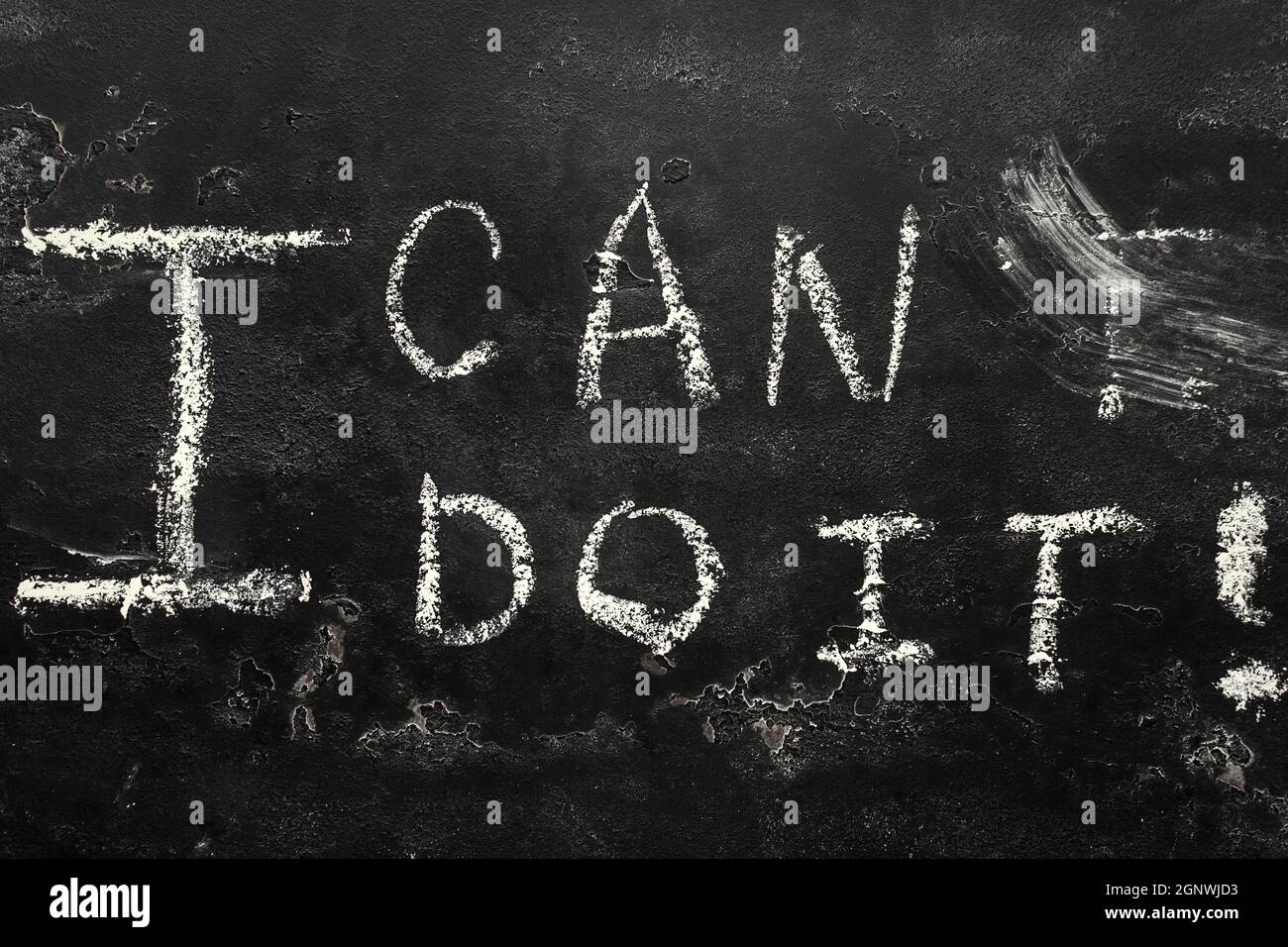 i can do it - chalk lettering on black background close up i can ...