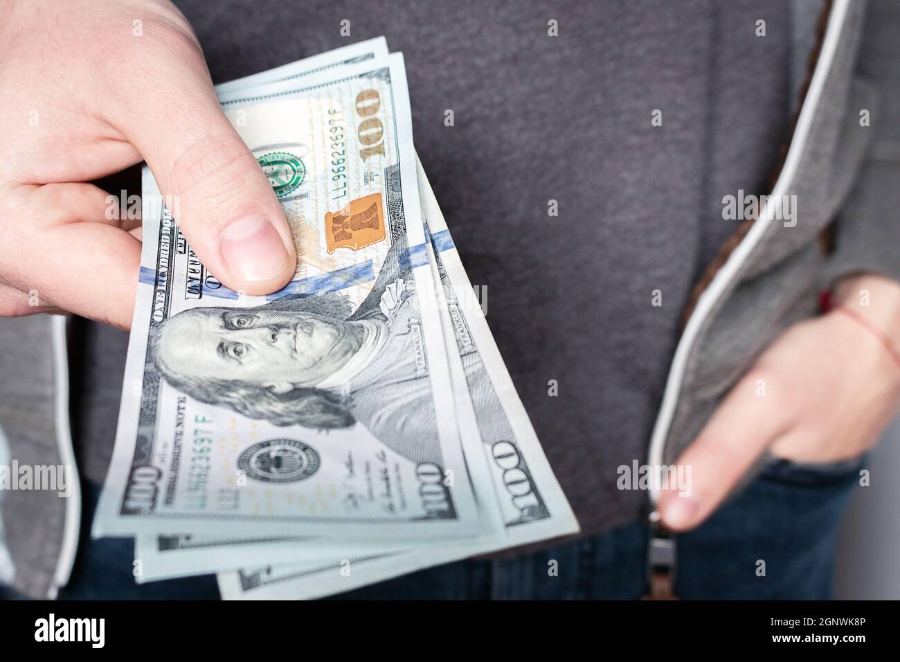 handing out money concept bribe Stock Photo - Alamy