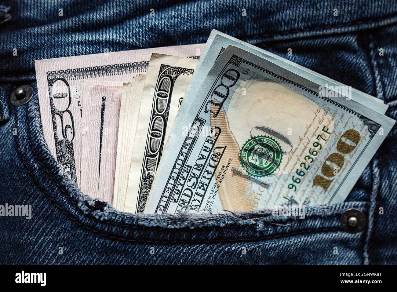 Money bills on pocket hi-res stock photography and images - Alamy