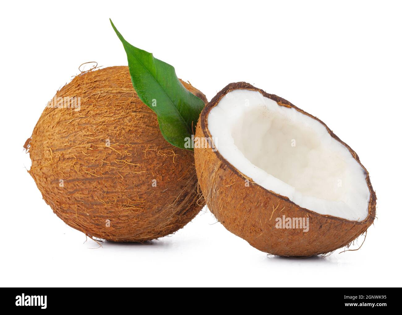 Cracked coconut with leaves isolated on white background Stock Photo ...
