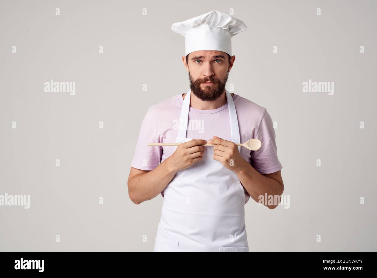 chef in the kitchen with a spoon in hand emotion cooking isolated ...